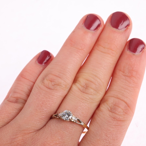 An 18ct gold (tested) 0.5ct single stone diamond ring, claw set with ...