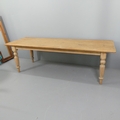 A hand made pitch pine scrub-top dining table, raised on turned legs ...
