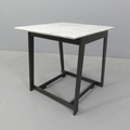 CAMERICH - An 'Element' white marble topped side table. W44cm, H46cm.