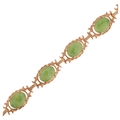 A 9ct gold nephrite panel bracelet, each panel set with oval cabochon ...