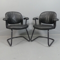 HERMAN MILLER - two leather Equa cantilever armchairs by Bill Stumpf ...