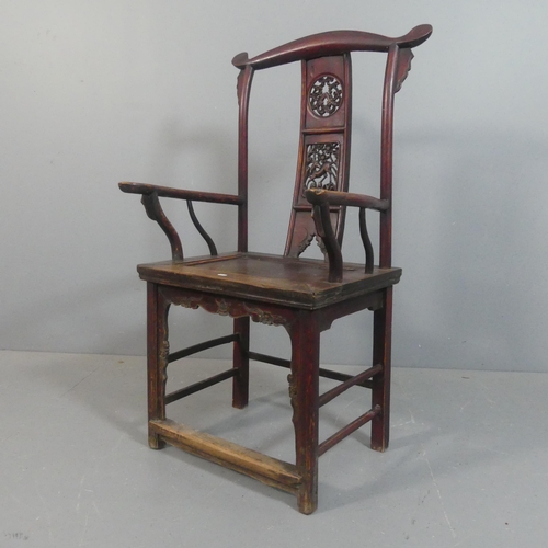 An antique elm Chinese emperor's throne chair, with carved and pierced ...