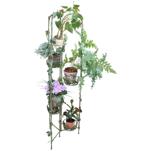 An ornate 3-fold 6-tier folding plant stand, together with various real ...