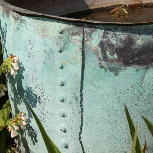 A large Victorian riveted copper water pot/boiler, diameter 62cm ...