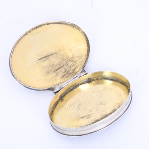 A Queen Anne silver and leather snuff box, circa 1700, oval form, with ...