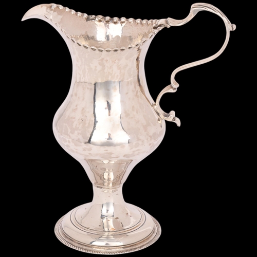A George III silver cream jug, Hester Bateman, London 1782, baluster ...