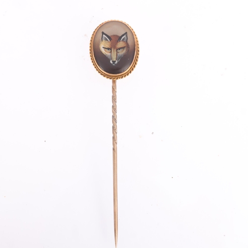 An Antique Victorian 15ct gold fox mask stickpin, the oval panel ...