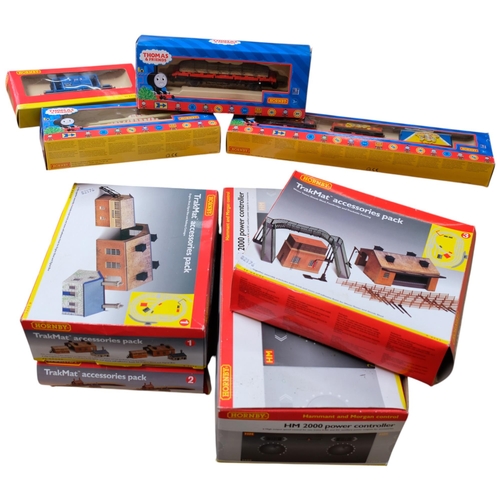 A collection of various Hornby train accessories and rolling stock ...