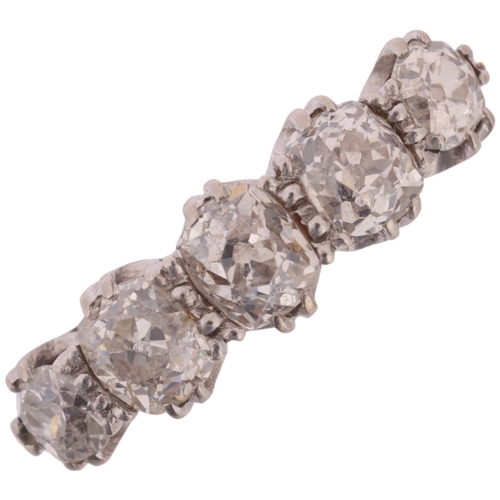 An 18ct gold five stone diamond half hoop ring, set with old-cut ...