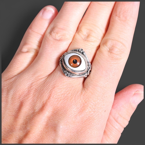 Jewellery: Eye ring Unmarked silver ring, with human eye setting.