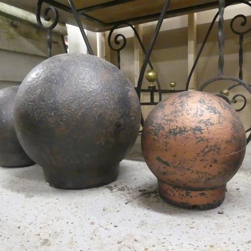 Four various reconstituted stone ball finials / gatepost toppers ...