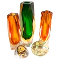 A pair of 1950s heavy amber cut-glass vases, 20cm, a similar green and ...
