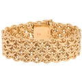 GARRARD & CO LTD - a heavy Vintage 18ct gold bracelet, import hallmarks ...