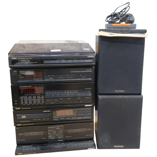 A collection of various Hi-Fi equipment in a stack, to include the Aiwa ...