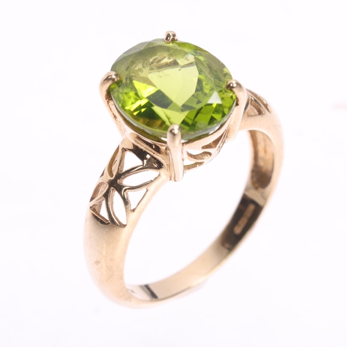 A 9ct gold single stone peridot ring, Gems TV, claw set with oval mixed ...
