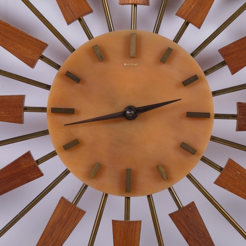 A mid-century starburst design wall clock, by Manley, with brass and ...