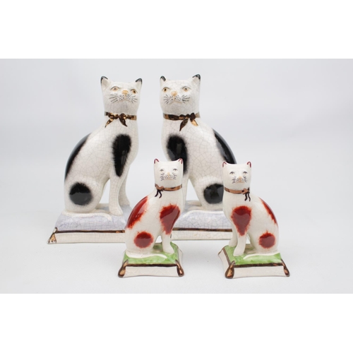 2 Sets of Staffordshire Mantel cats