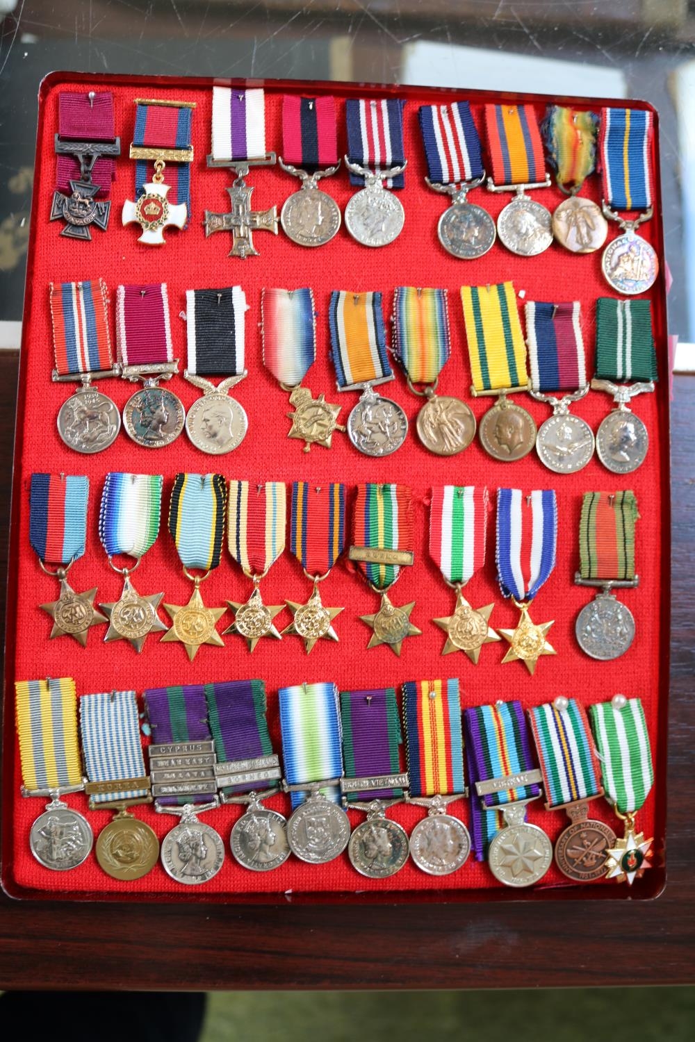 Collection of assorted Military Miniature Medals with ribbons