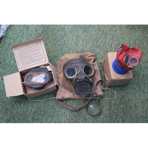 380 - Three WW2 Gas Masks with boxes