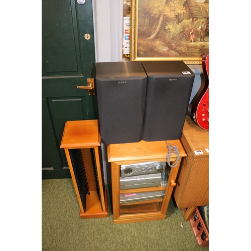 310 - Sony Stacking stereo system with speakers, cabinet and CD Rack