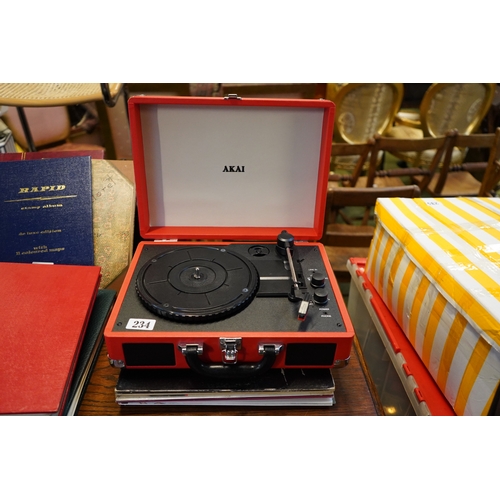 234 - Akai Portable record Player and a Collection of assorted Vinyl ...