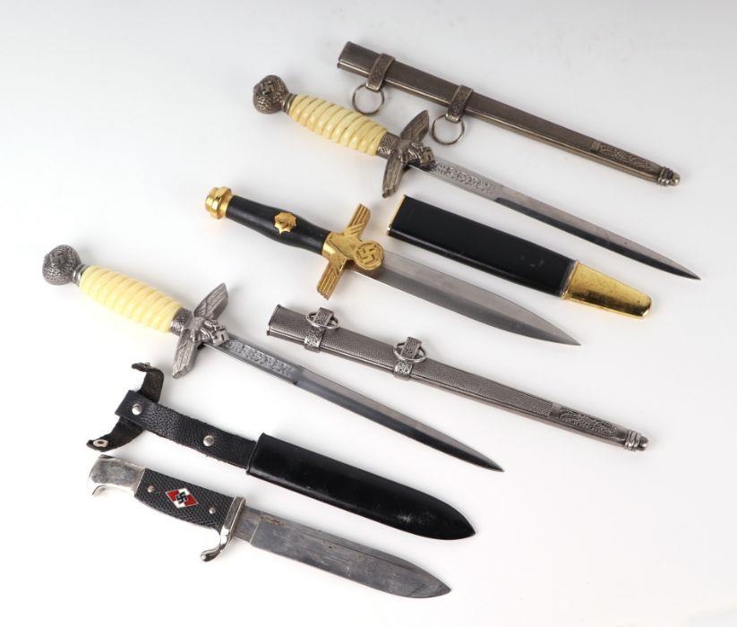 Four replica Nazi dress daggers including Luftwaffe. The Hitler Youth ...