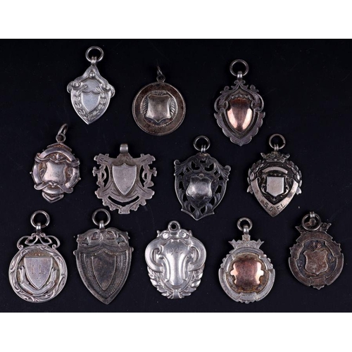 A quantity of silver pocket watch fobs, various dates and makers marks ...