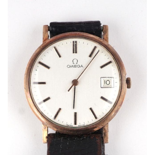 An Omega 9ct gold gentleman's wristwatch, the white dial with baton ...