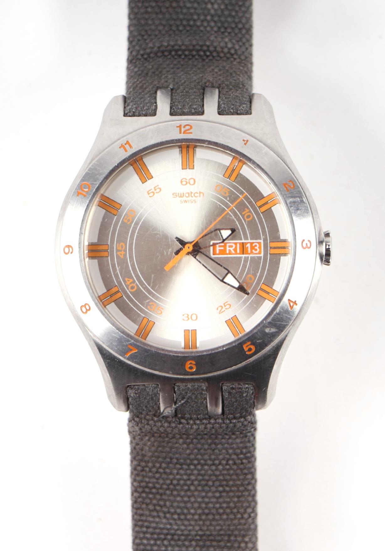 A gentleman's vintage Swatch wristwatch, numbered 'SR626SW', on a ...