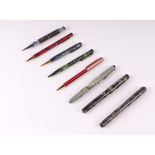 A small collection of fountain pens and propelling pencils to include ...