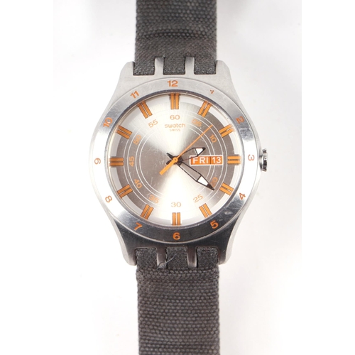 A gentleman's vintage Swatch wristwatch, numbered 'SR626SW', on a ...