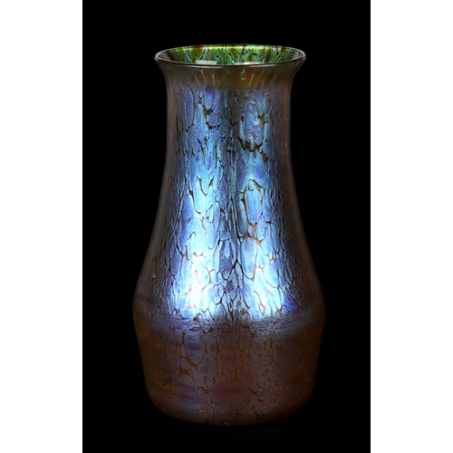 A Loetz style art glass vase with iridescent decoration, 17cm high