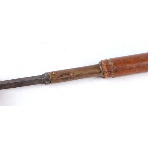 A military wooden swagger/sword stick, having a short stiletto blade ...