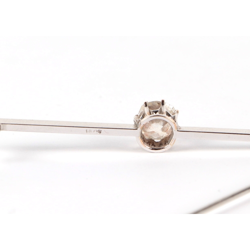 A 14ct white gold diamond solitaire bar brooch, diamond approx 6mm ...