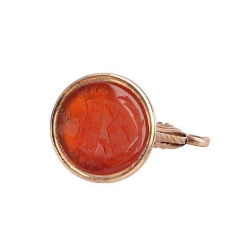 A 19th century yellow metal (tests as gold) fob seal, the intaglio ...
