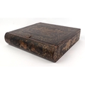 A Chinese lacquer writing box decorated with gilded figures on a black ...