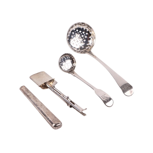 A George III silver cheese scoop with shovel shaped blade and sliding ...