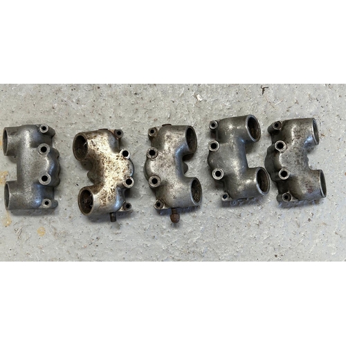 A quantity of assorted Triumph motorcycle aluminium cylinder head valve ...
