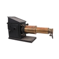 A Victorian Magic Lantern with brass twin-draw lens and black lacquered ...