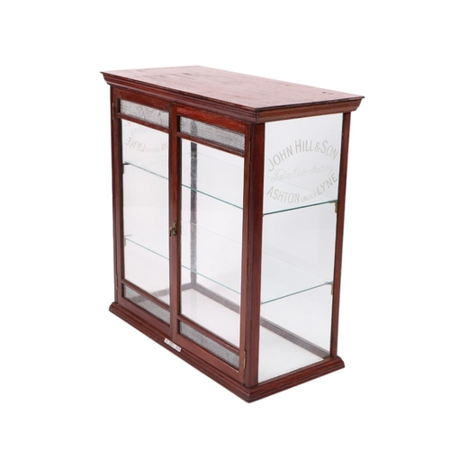 An Edwardian mahogany table top shop display cabinet, bears enamel ...
