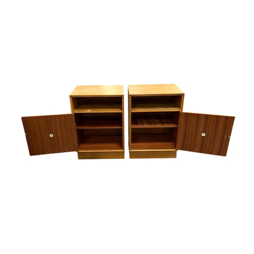 A pair of mid century design Meredew oak bedside cupboards, 46cms wide ...