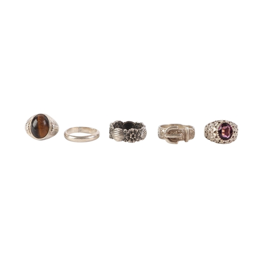 A group of five gentlemen's silver rings to include tigers eye and ...