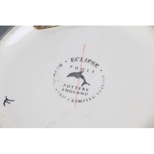 A Poole pottery Eclipse pattern charger 41cm diameter (second) together ...