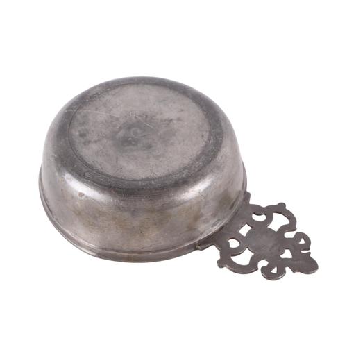 Medical interest. A late 18th century pewter bleeding bowl with ...