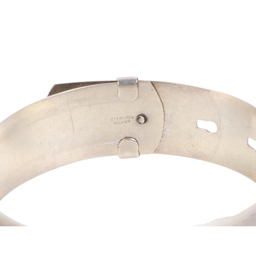 A pair of sterling silver belt design bangles, 40g.