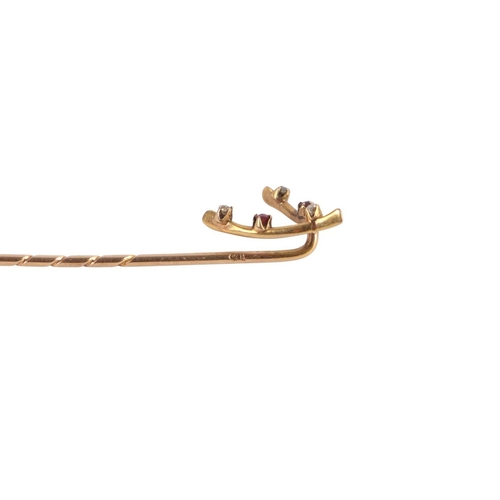 A 15ct gold wishbone stick pin set with rubies and diamonds, 1.5g ...