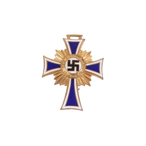 A WWII Third Reich Faithful Service medal; together with a WWII Third ...