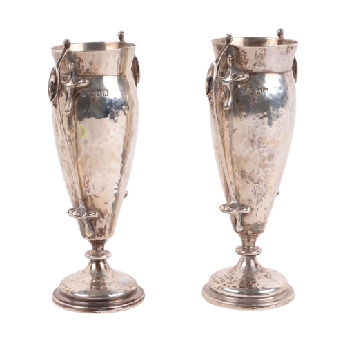 A pair of Arts & Crafts silver twin-handled vases, London 1905 and ...