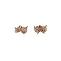A pair of 9ct gold fox mask cufflinks with ruby set eyes, 8.7g.