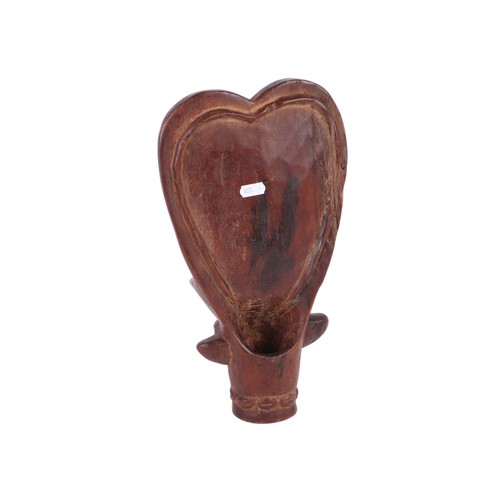 An African carved wooden Batcham mask, from the Bamileke region of ...